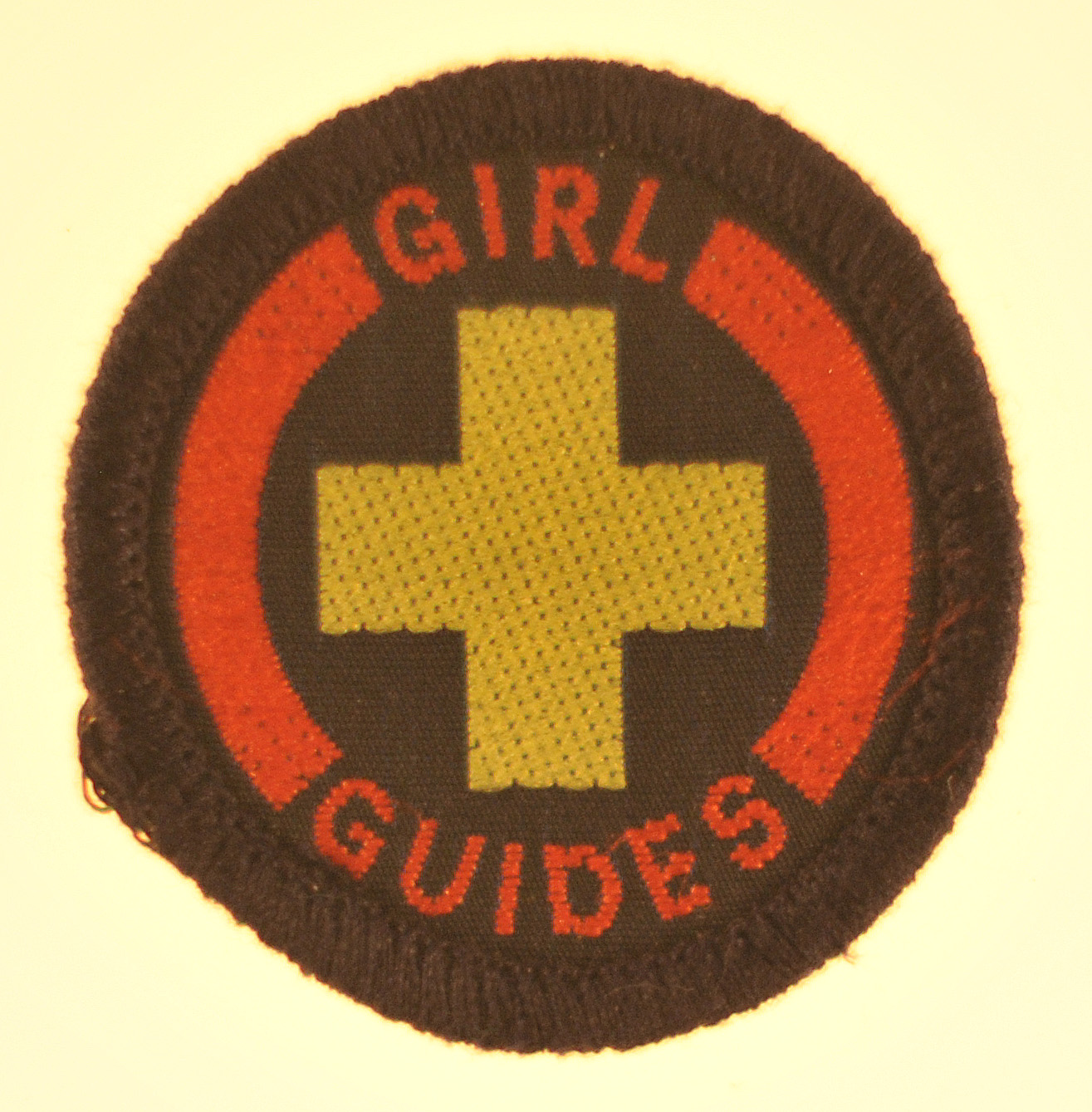 guide-interest-badge-civil-defence-red-border-yellow-cross - Guiding ...